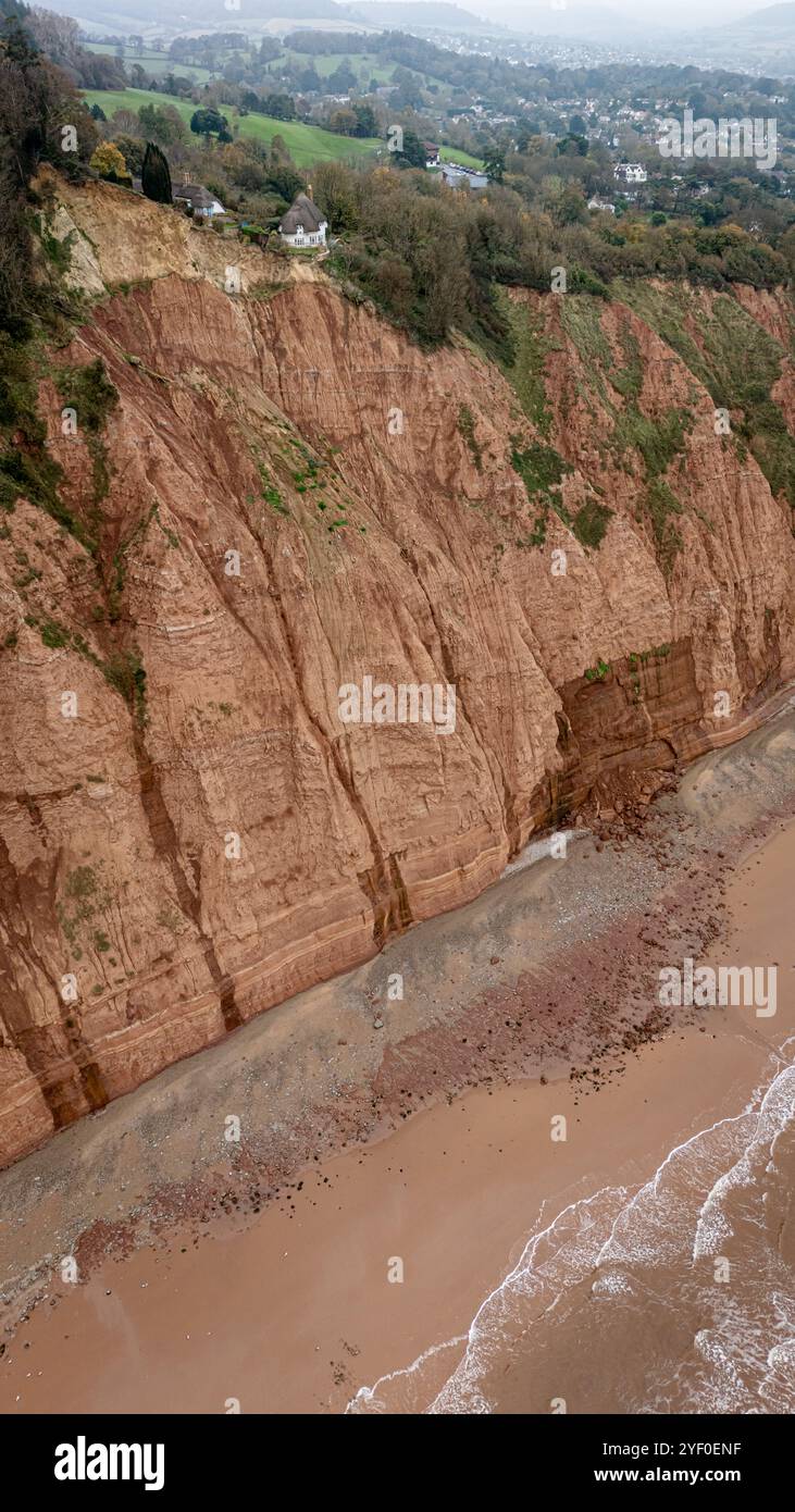 A cottage, sitting 10-metres from a cliff edge with a 400ft drop ...