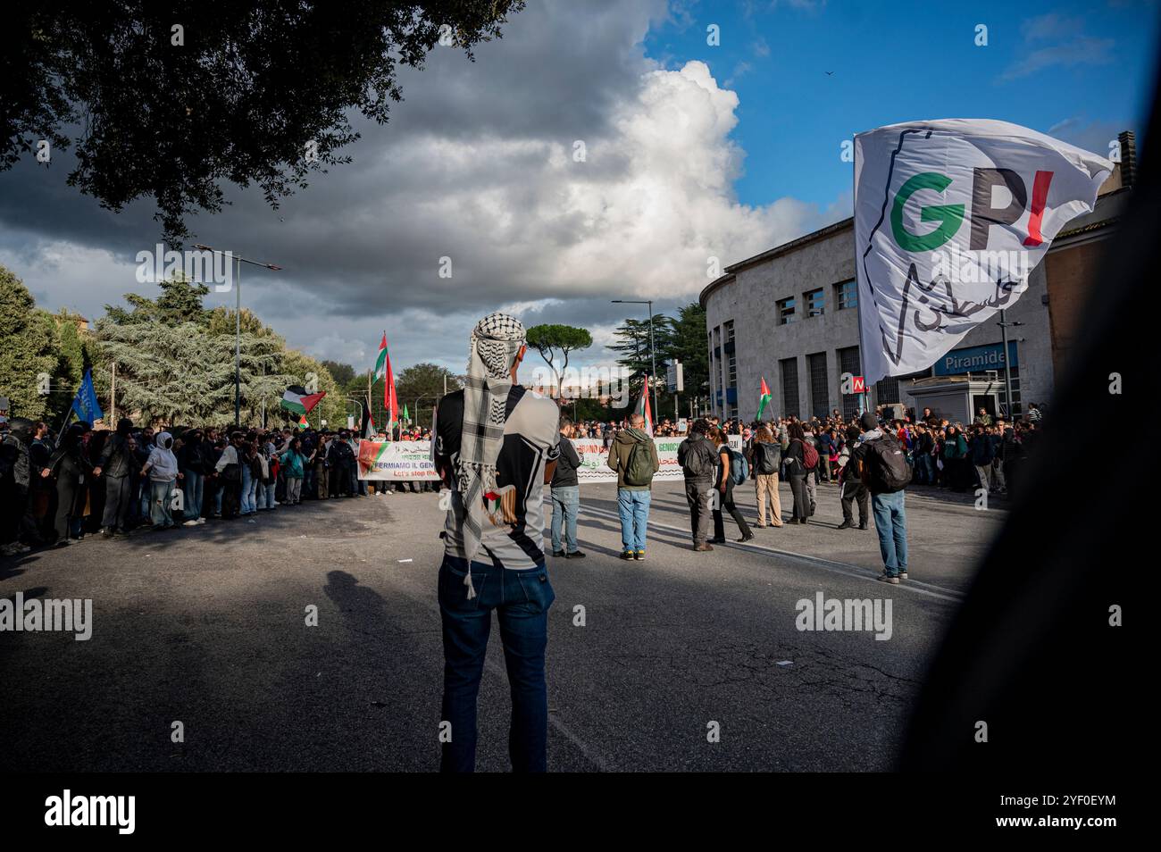 ProPal protester standing in front of peaceful crowd at the 5th October ...