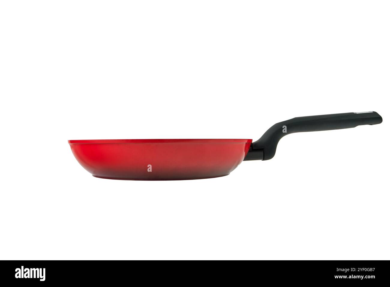 Red Flying black pan isolated with clipping path on white background ...