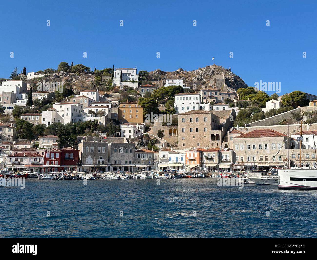 Waterfront townscape and harbour view, Hydra, Saronic Islands, Greece ...