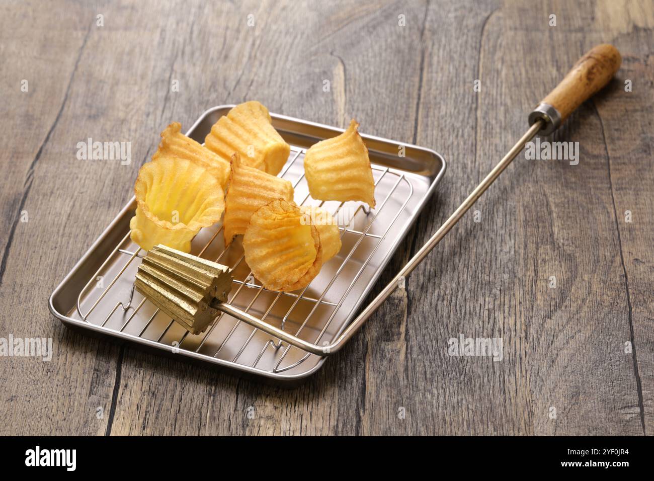 A mold for making small cup for Kuih pie tee(Malaysian appetizer Stock ...
