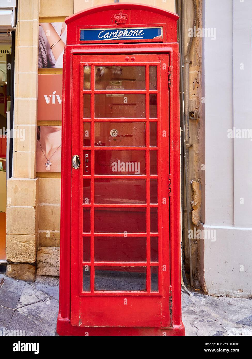 Traditional red telephone box in the old town of Valletta, Malta Stock ...