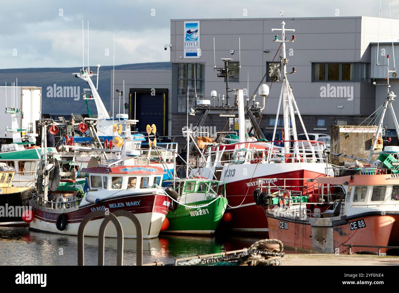 Fishing boats in co donegal harbour hi-res stock photography and images ...