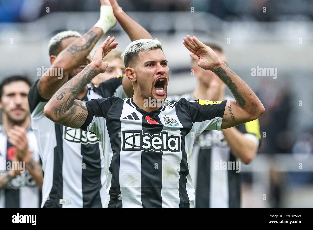 Bruno Guimarães of Newcastle United and team mates celebrate their 1-0 ...