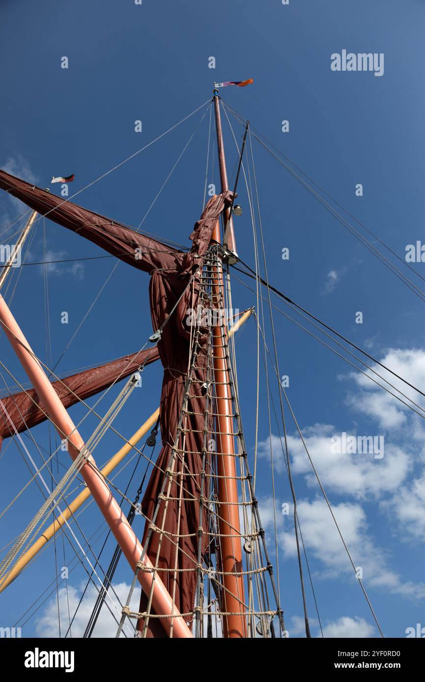Masts and rigging on a Thames sailing barge for use as a background ...