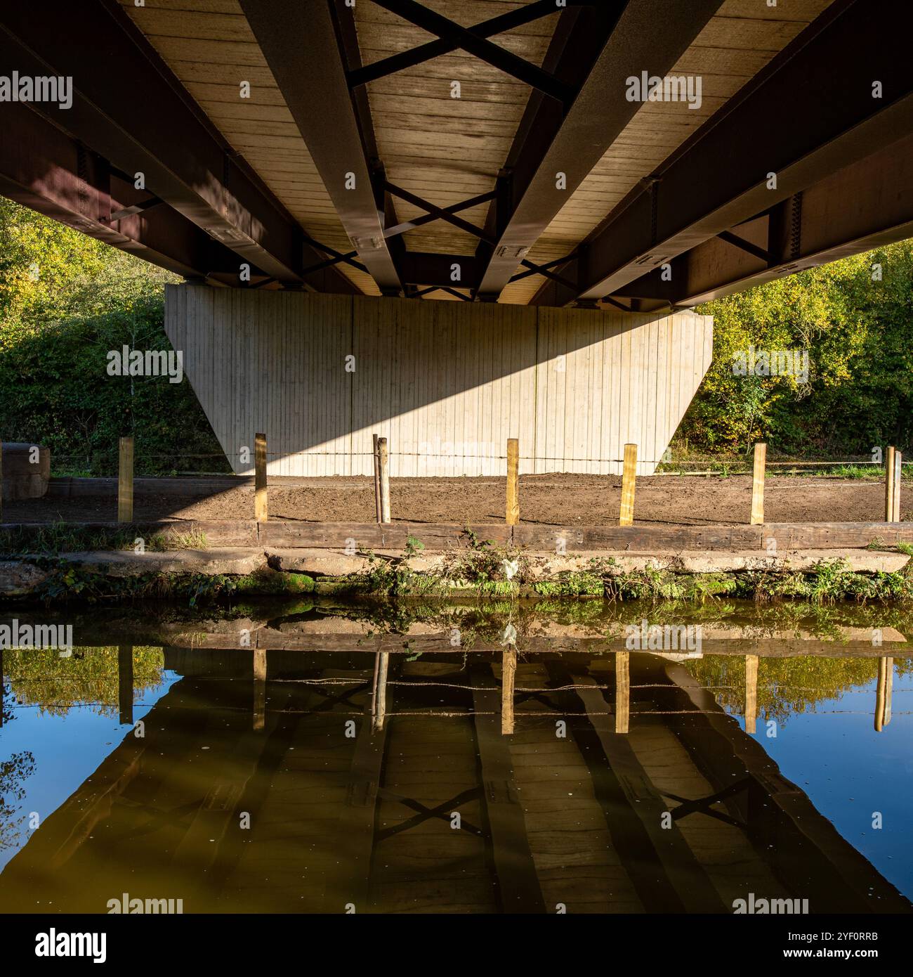 View under viaduct over canal Stock Photo - Alamy