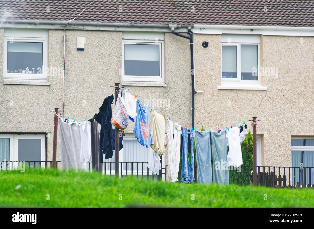 Washing line with towels drying in the garden Stock Photo - Alamy