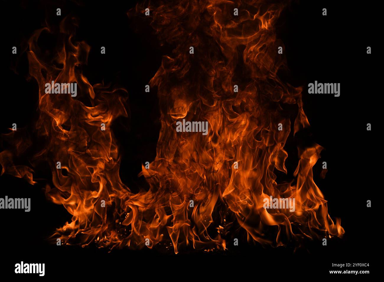 Blaze burning fire flame on art texture background Stock Photo - Alamy