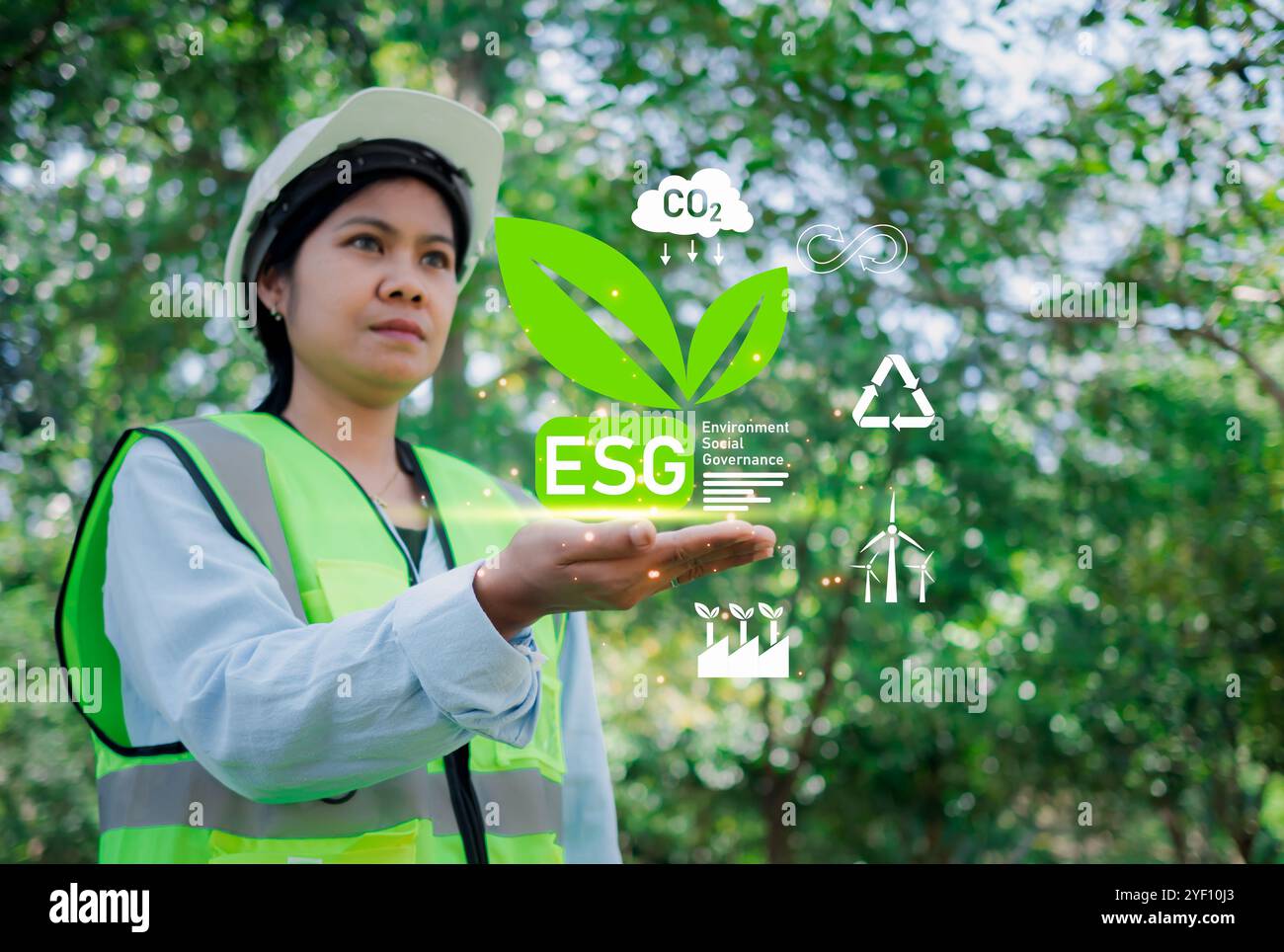 Woman engineer wearing a safety helmet on his head check the weather ...