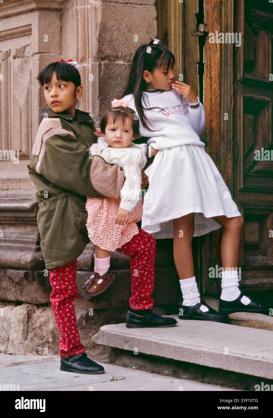 Young girls at Basilica entrance, Guanajuato, Mexico Stock Photo - Alamy