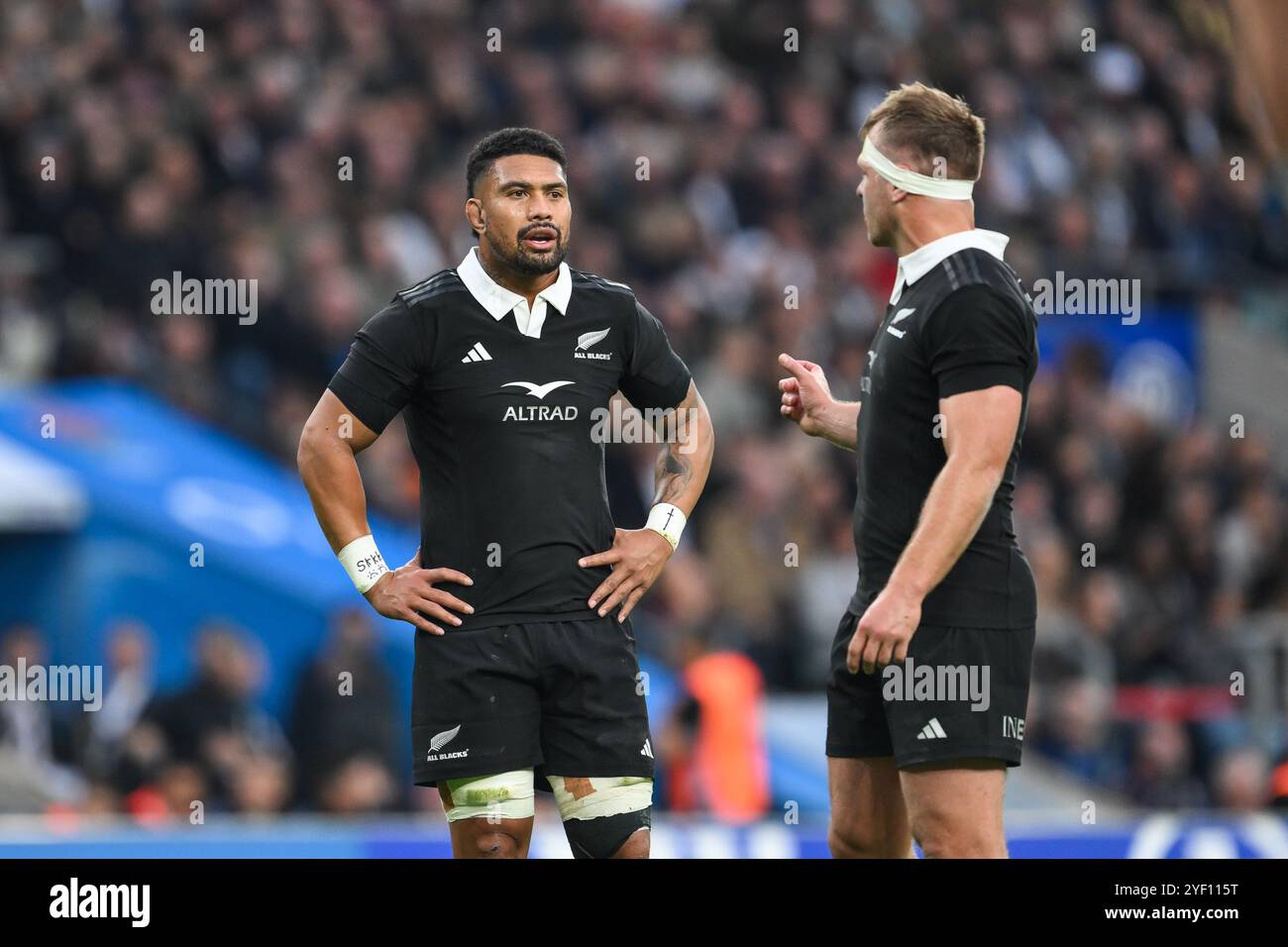 Sam Cane of New Zealand speaks to Ardie Savea of New Zealand during the ...