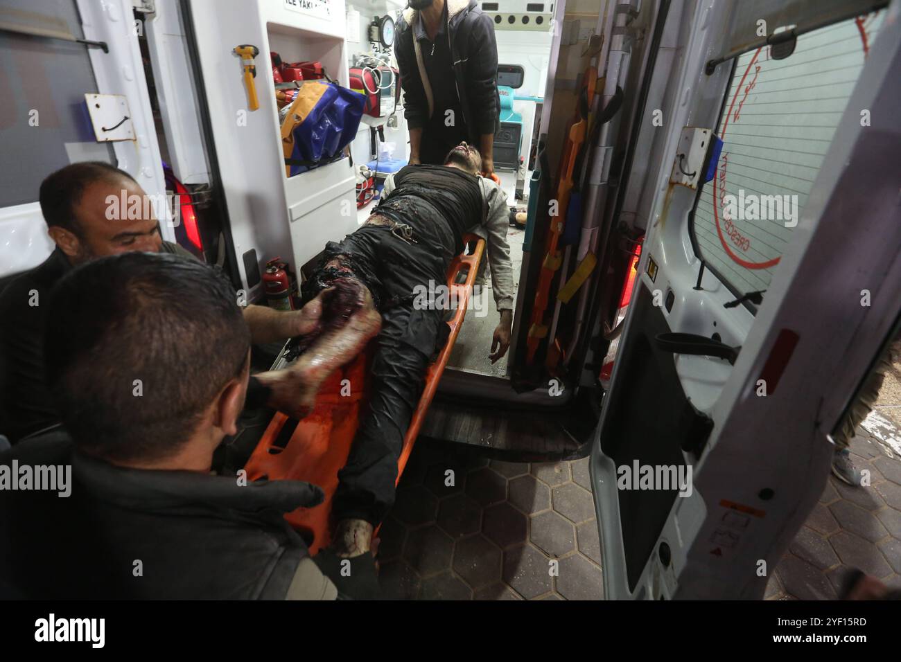 Palestinian paramedics transport bodies of victims following Israeli ...