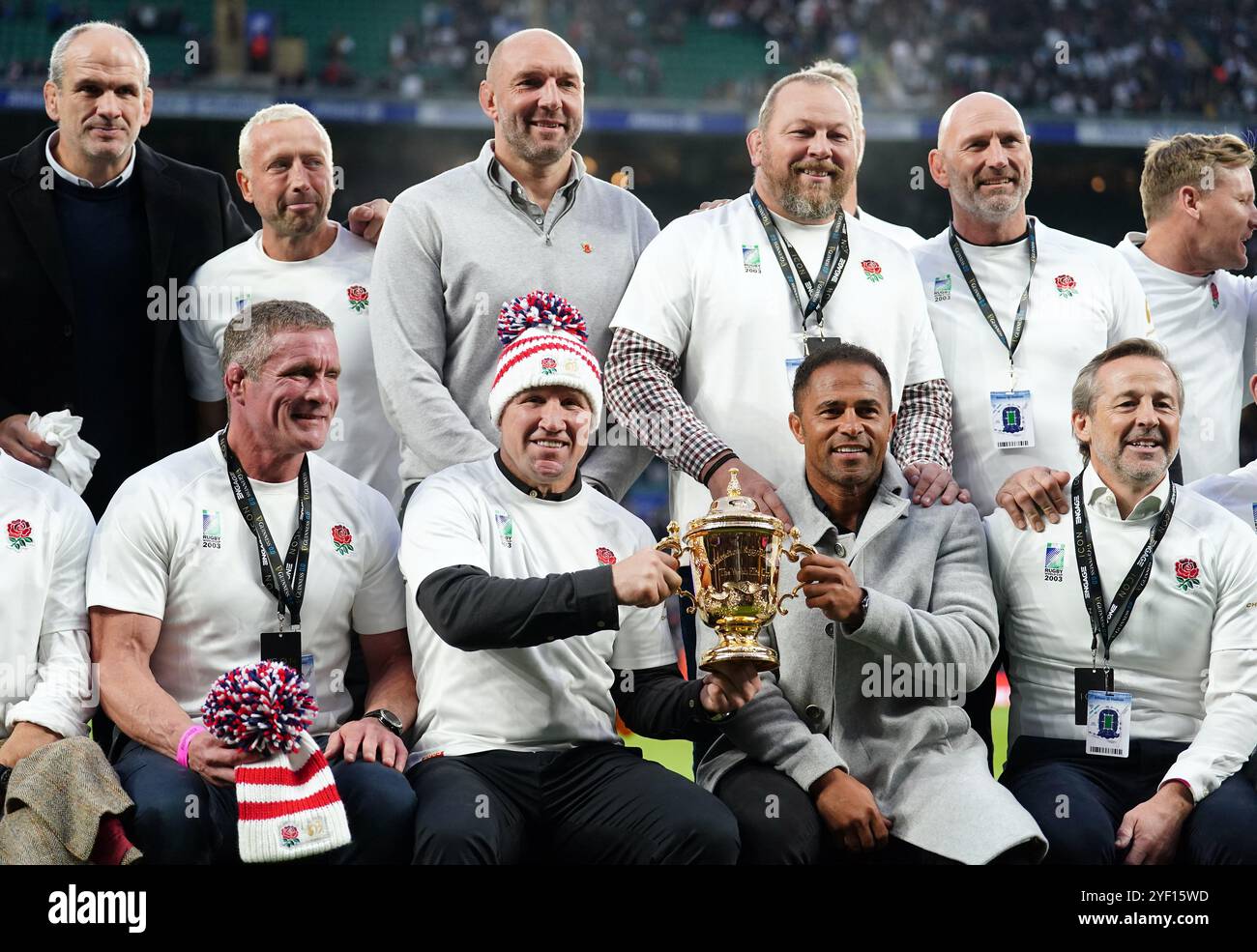 England's 2003 World Cup winning squad with the trophy during the ...