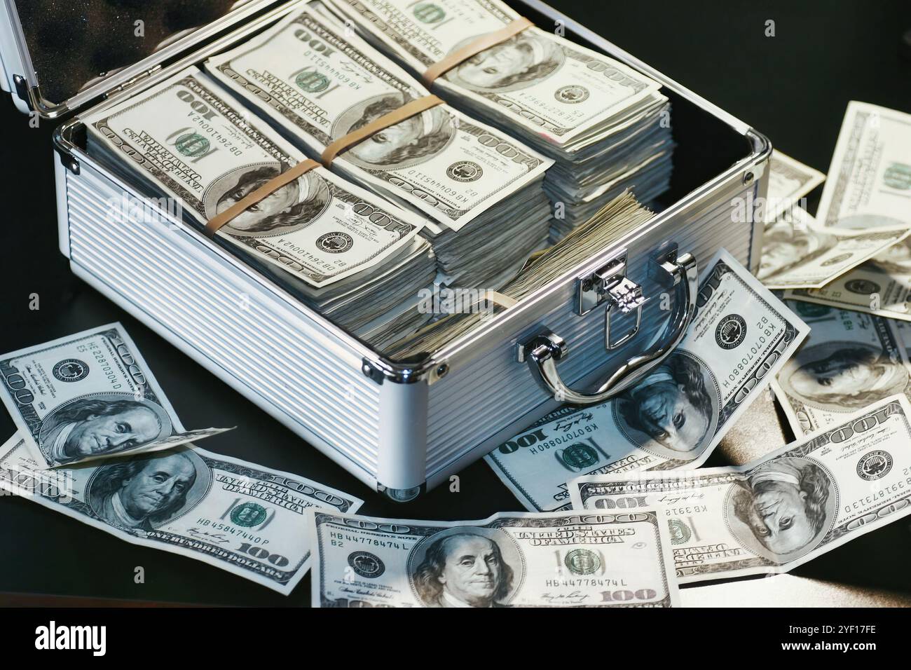 Stacks of 100 dollar bills on table hi-res stock photography and images ...