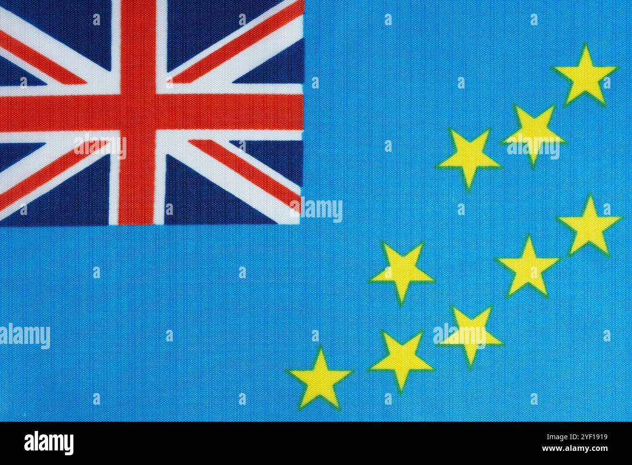 Background, flag Polynesian island state on textured fabric Stock Photo ...