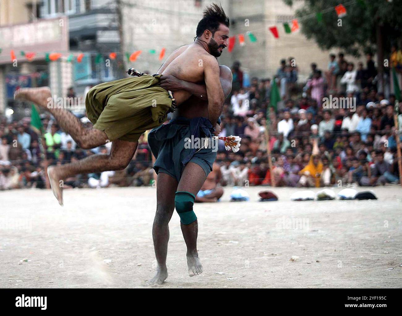 Wrestlers in action during the Sindh traditional wrestling Malh on the ...