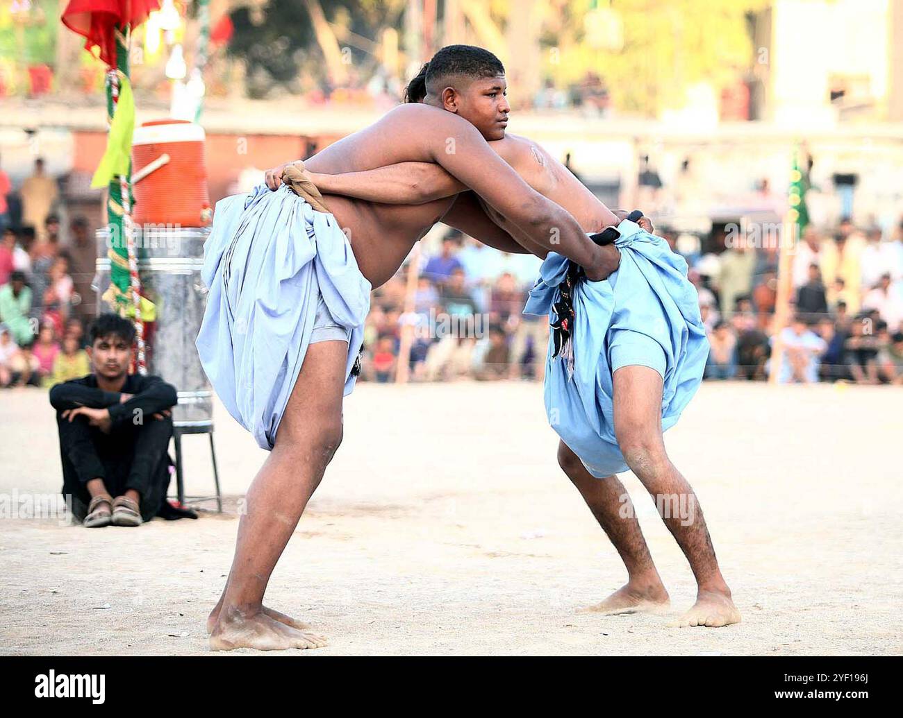 Wrestlers in action during the Sindh traditional wrestling Malh on the ...