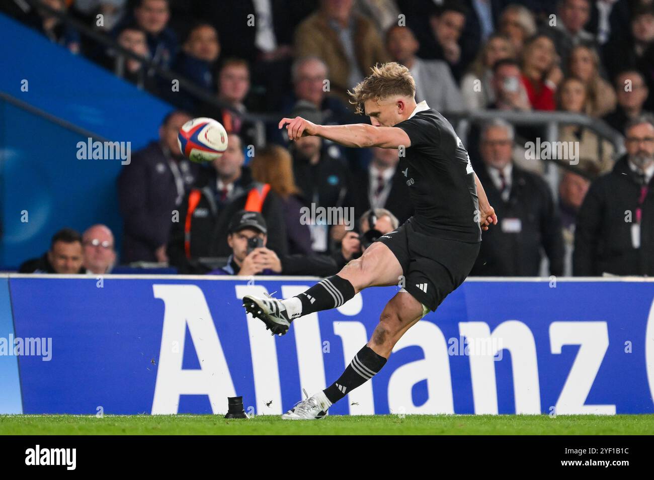 Damian McKenzie of New Zealand converts his side try during the Autumn ...