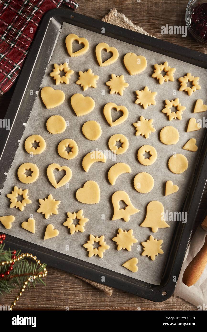 Pastry dough shapes on a baking sheet - preparation of homemade Linzer ...