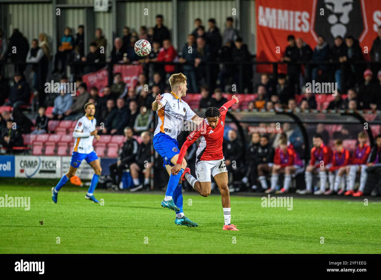 Kyrell Malcolm of Salford City FC under pressure from Shrewsbury Town ...