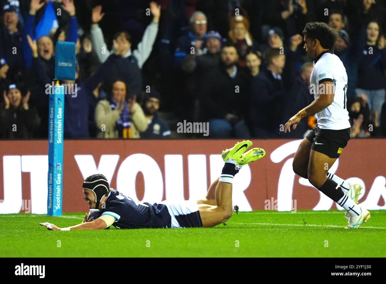 Scotland's Darcy Graham scores his side's third try of the game during ...