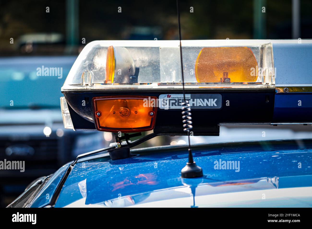 Vintage Federal Signal Streethawk lightbar on blue Crown Victoria ...