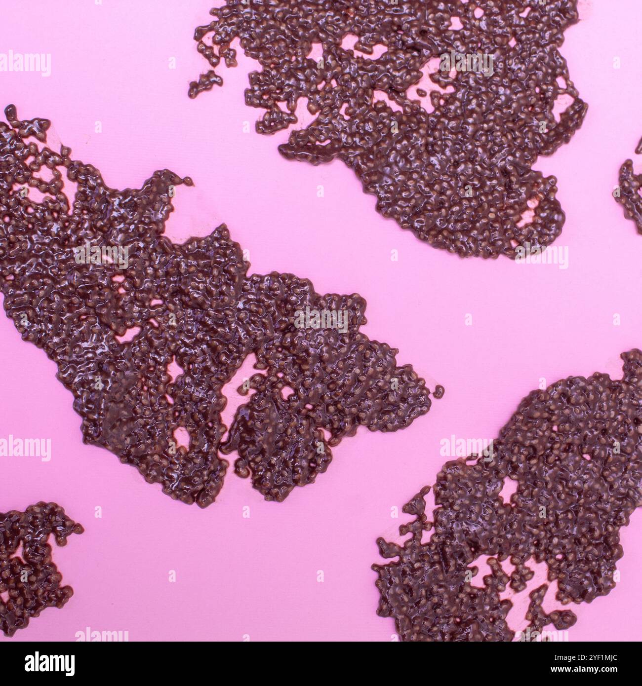 Texture of a smeared chia pudding on a pink background Stock Photo - Alamy