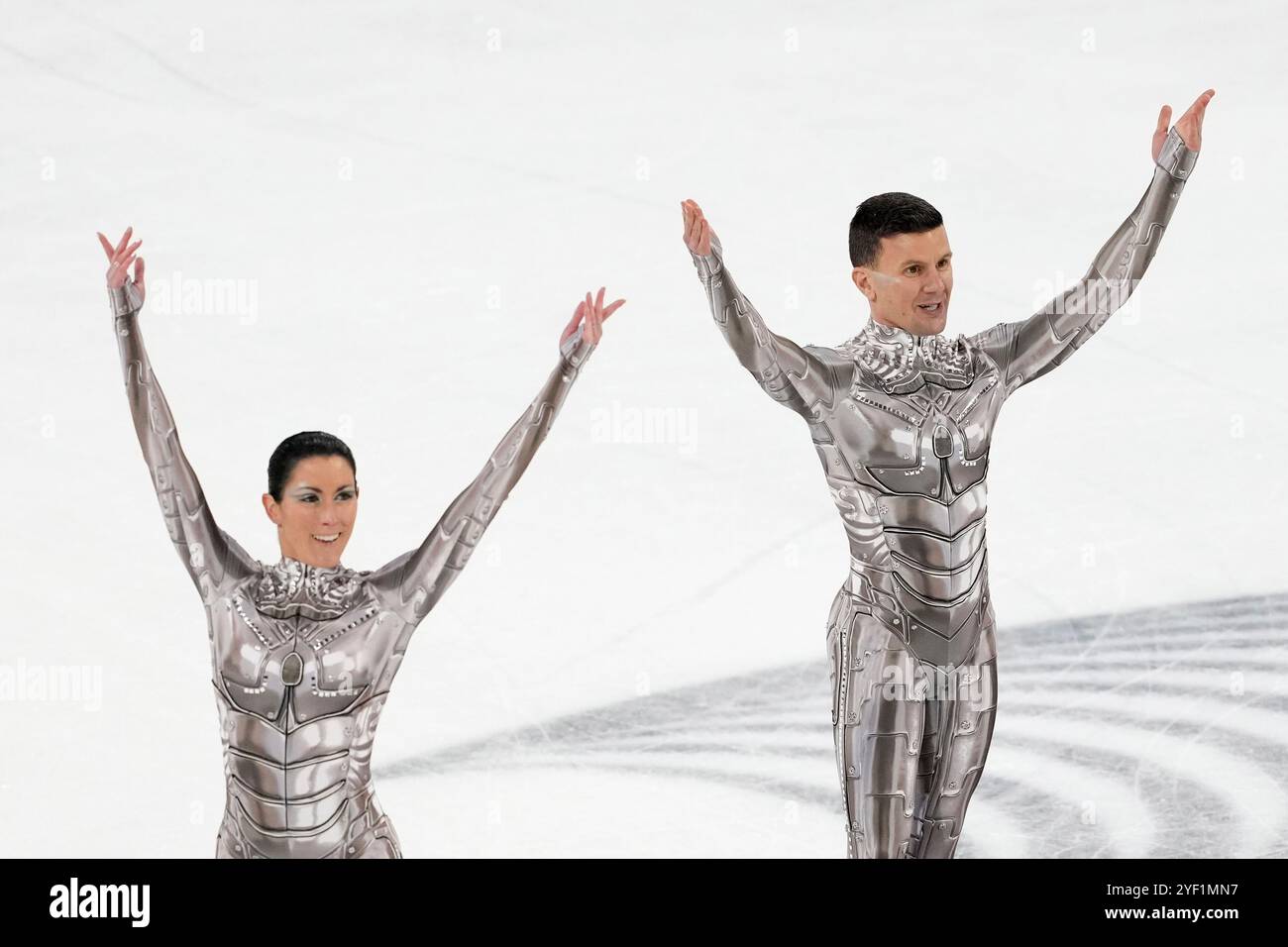 Charlene Guignard and Marco Fabbri, of Italy, gesture after competing ...