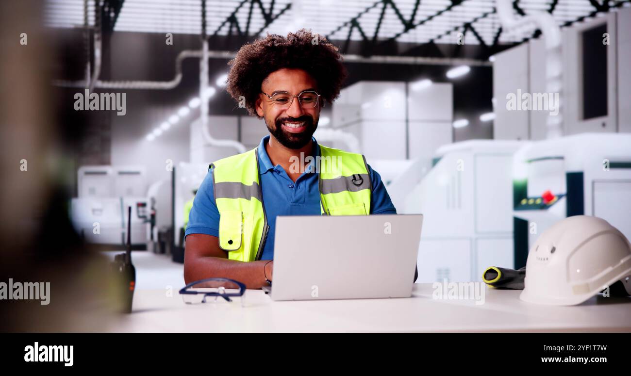 Happ Engineer Using PC In Automated Semiconductor Assembly Line Stock ...