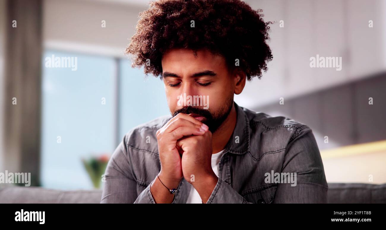 African American Man Praying. God Seeking Prayer Stock Photo - Alamy