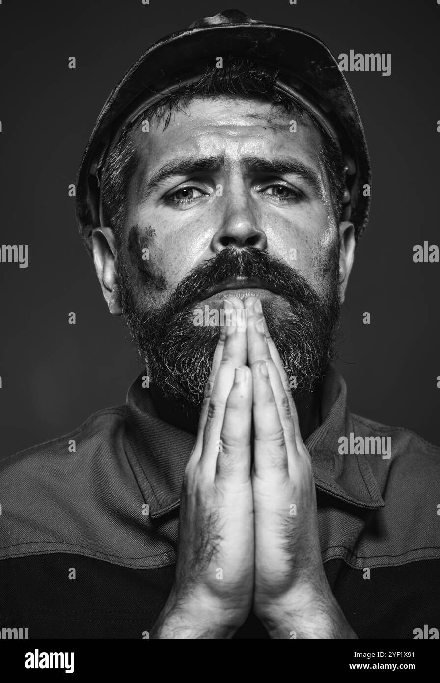 Mechanical worker in uniform and helmet. Construction worker hoping to ...