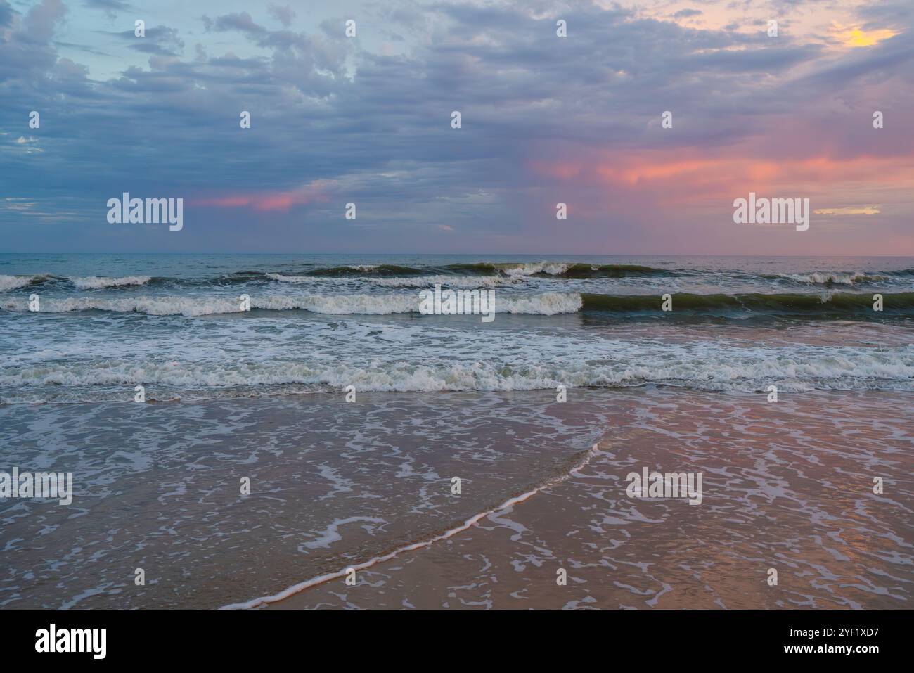 Gentle waves roll onto soft hi-res stock photography and images - Alamy
