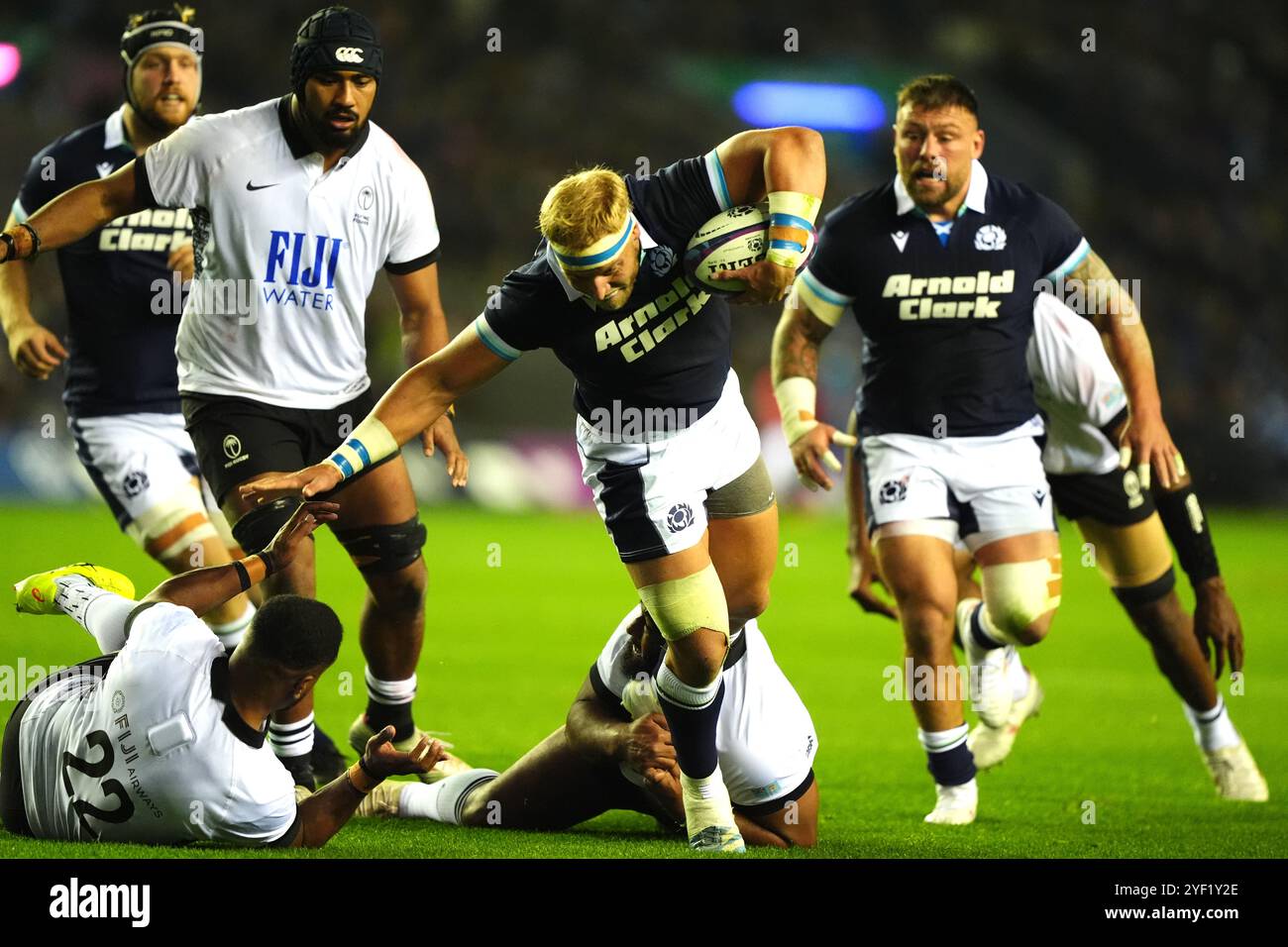 Scotland's Dylan Richardson is tackled during the Autumn international ...
