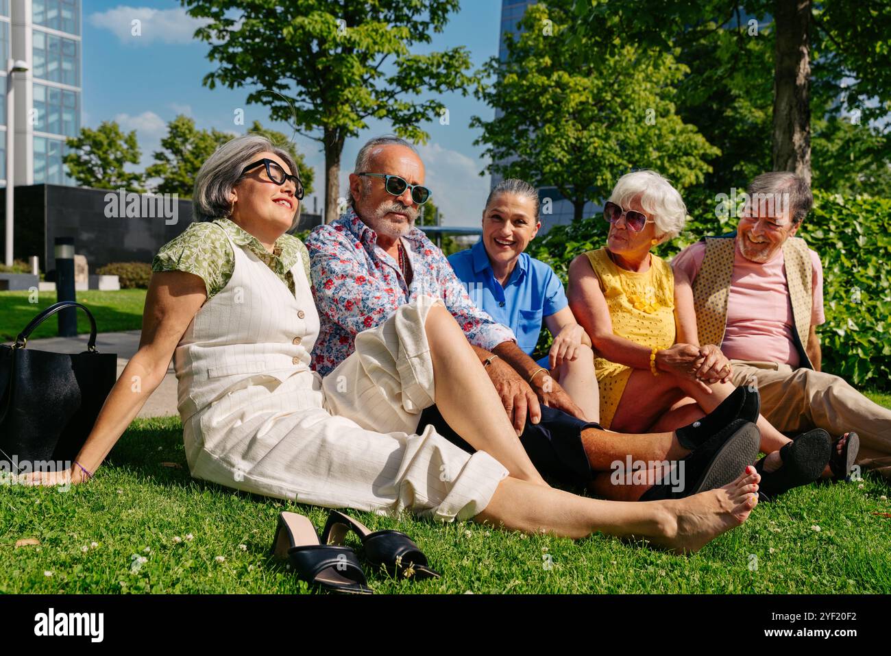 Group of senior friends meeting outdoors in the city and having fun ...