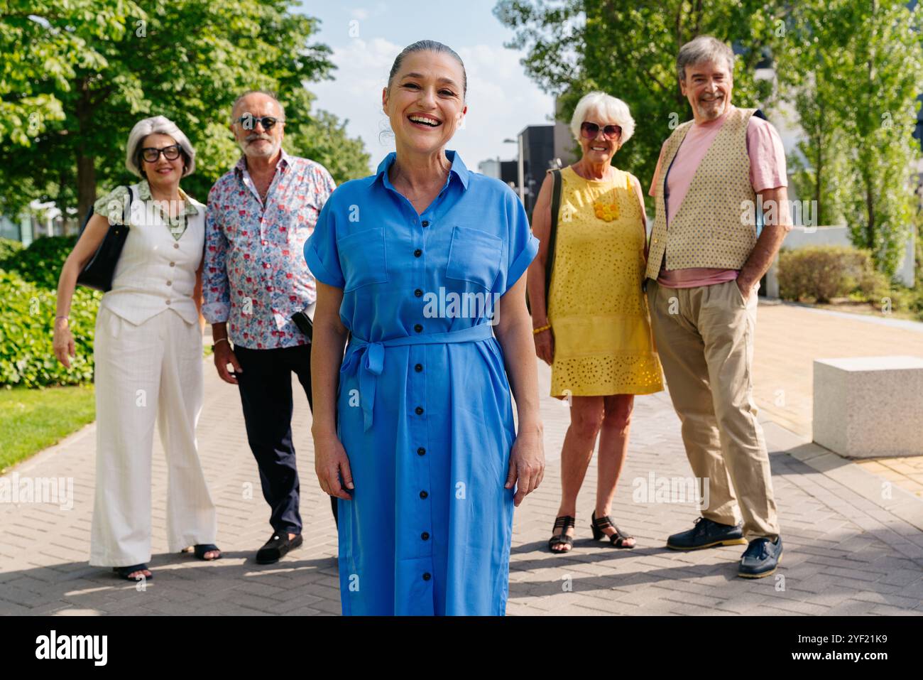 Group of senior friends meeting outdoors in the city and having fun ...
