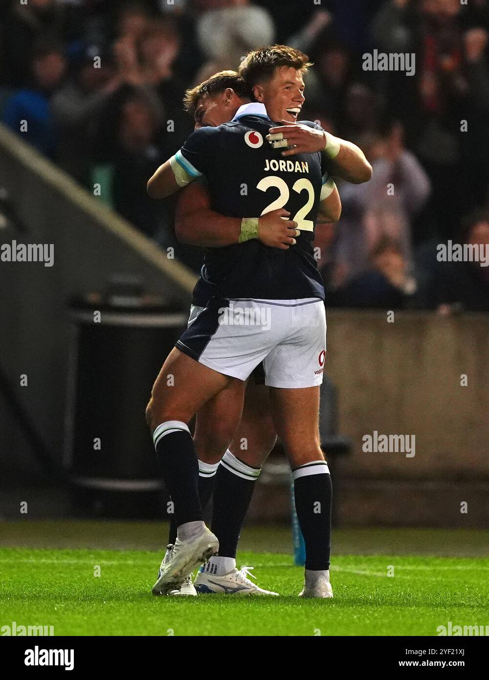 Scotland's Huw Jones (left) celebrates scoring his side's eigth try of ...