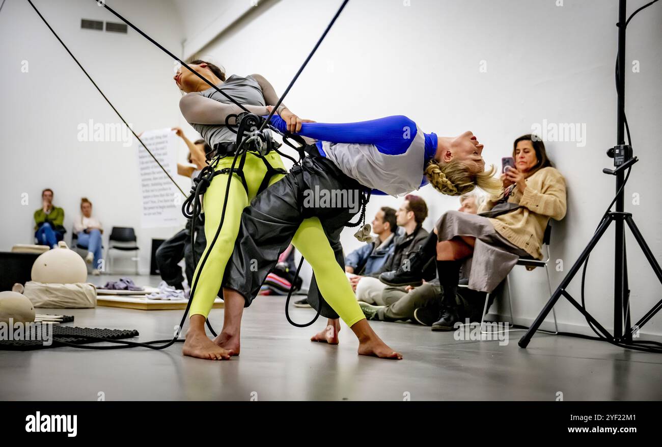 AMSTERDAM - Visitors at the FLAM Whispering Skins, exhibitionArti et ...