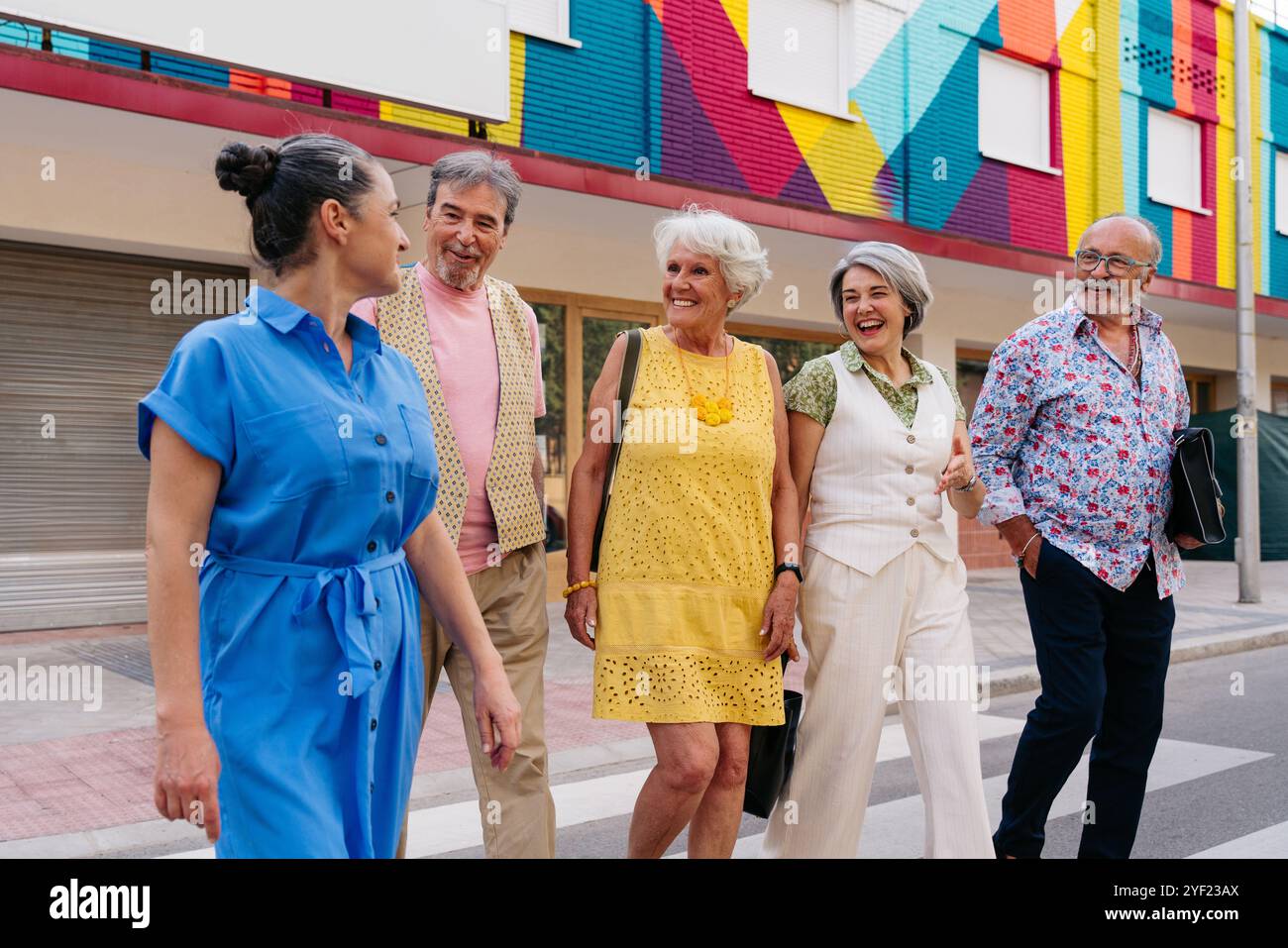 Group of senior friends meeting outdoors in the city and having fun ...