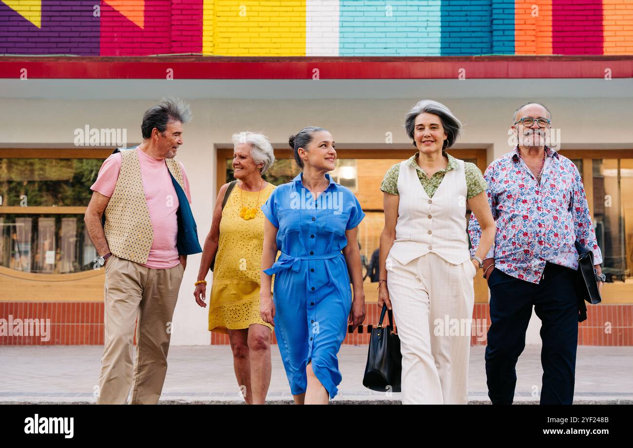 Group of senior friends meeting outdoors in the city and having fun ...