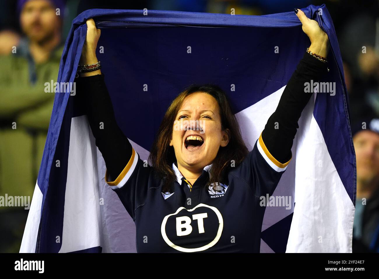 A Scotland fan holds up a flag during the Autumn international match at ...