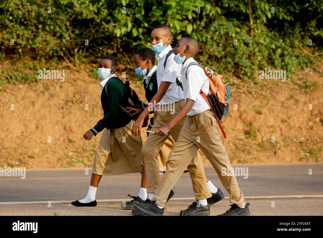 Teenagers walking from school in Kigali, Rwanda Teenagers walking from ...