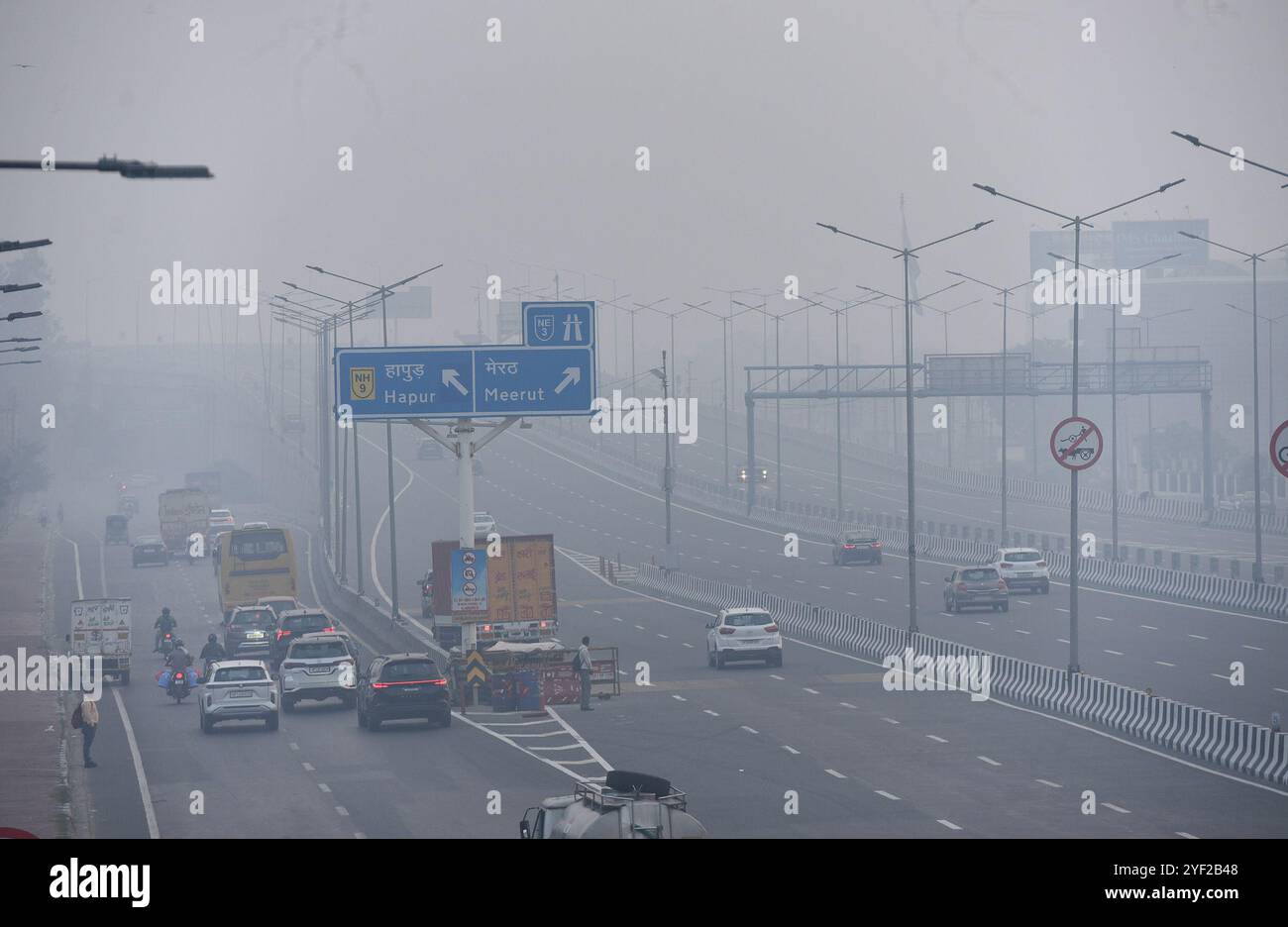 GHAZIABAD, INDIA - NOVEMBER 2: Vehicles move on a Delhi Meerut ...