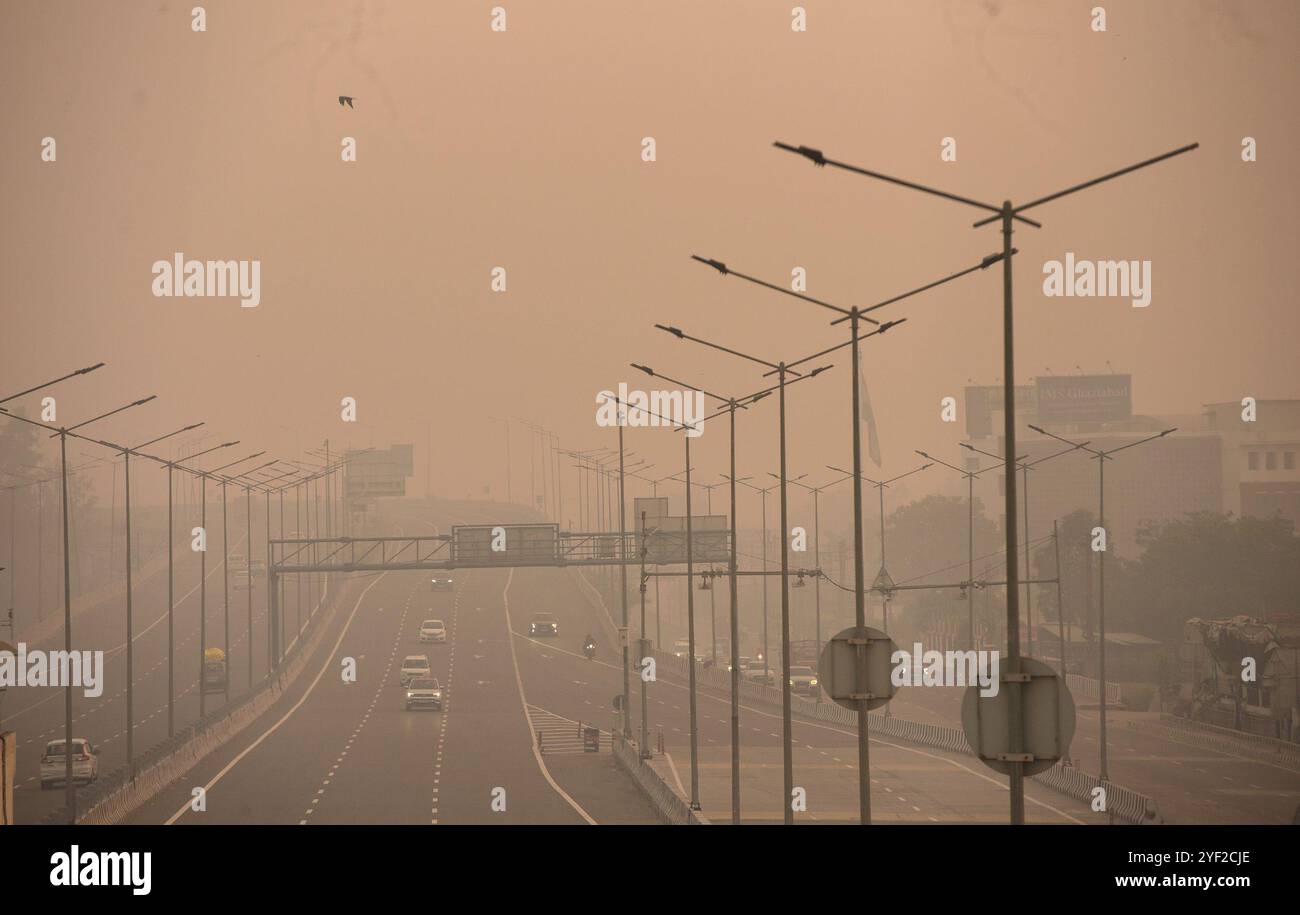 GHAZIABAD, INDIA - NOVEMBER 2: Vehicles move on a Delhi Meerut ...