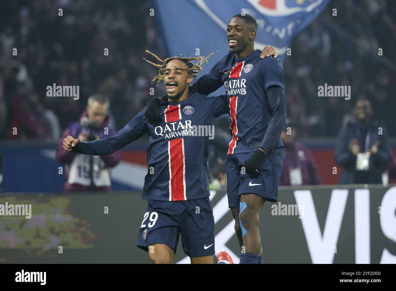 Ousmane Dembele of PSG celebrates his goal with Bradley Barcola (left ...