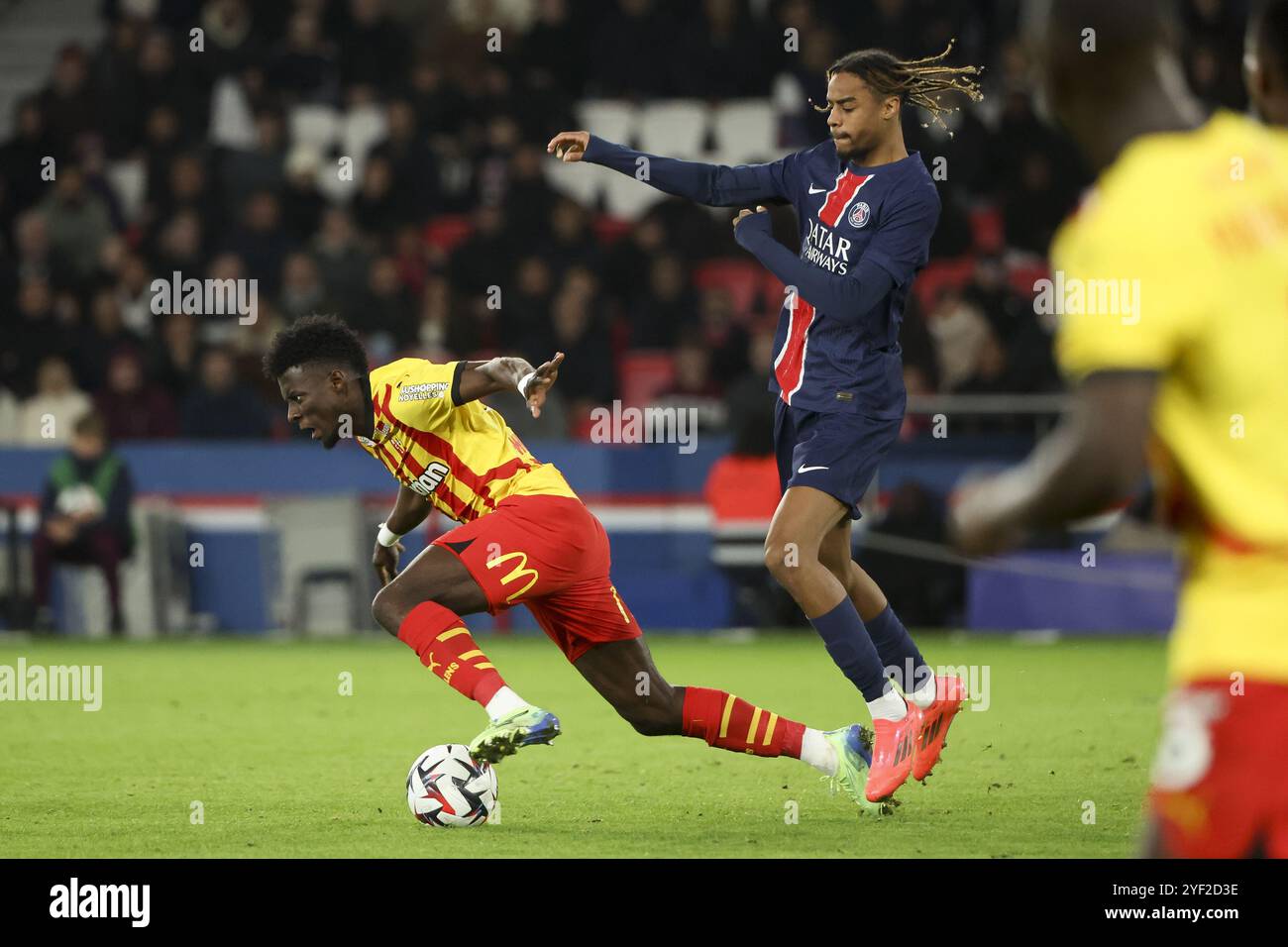 Jhoanner Chavez of Lens, Bradley Barcola of PSG during the French ...