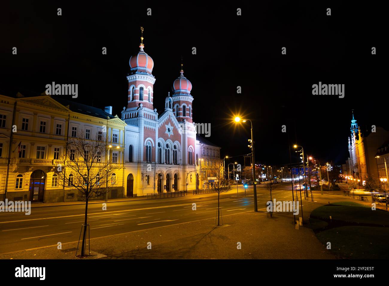 A captivating night view of the illuminated synagogue in Pilsen ...