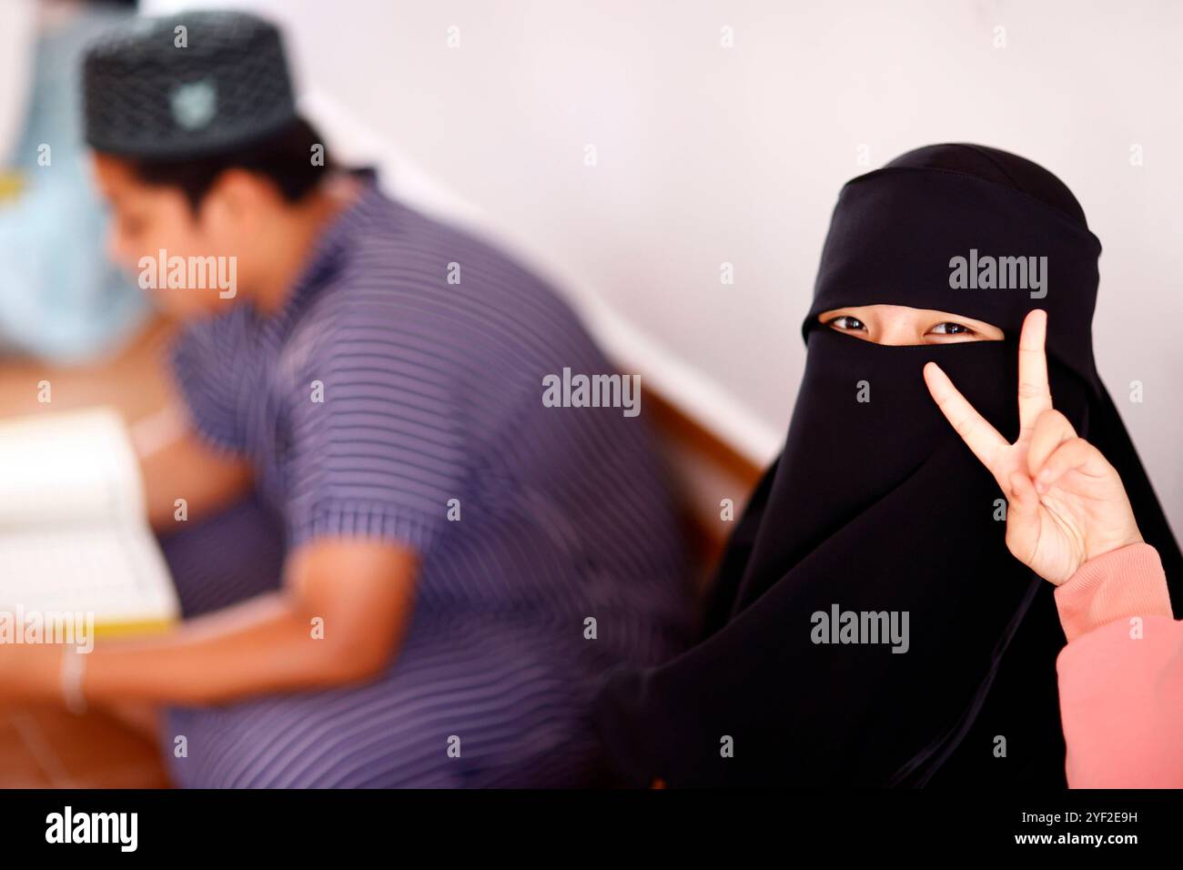 Islamic school. Students studying he Holy Quran. Vietnam. Islamic ...