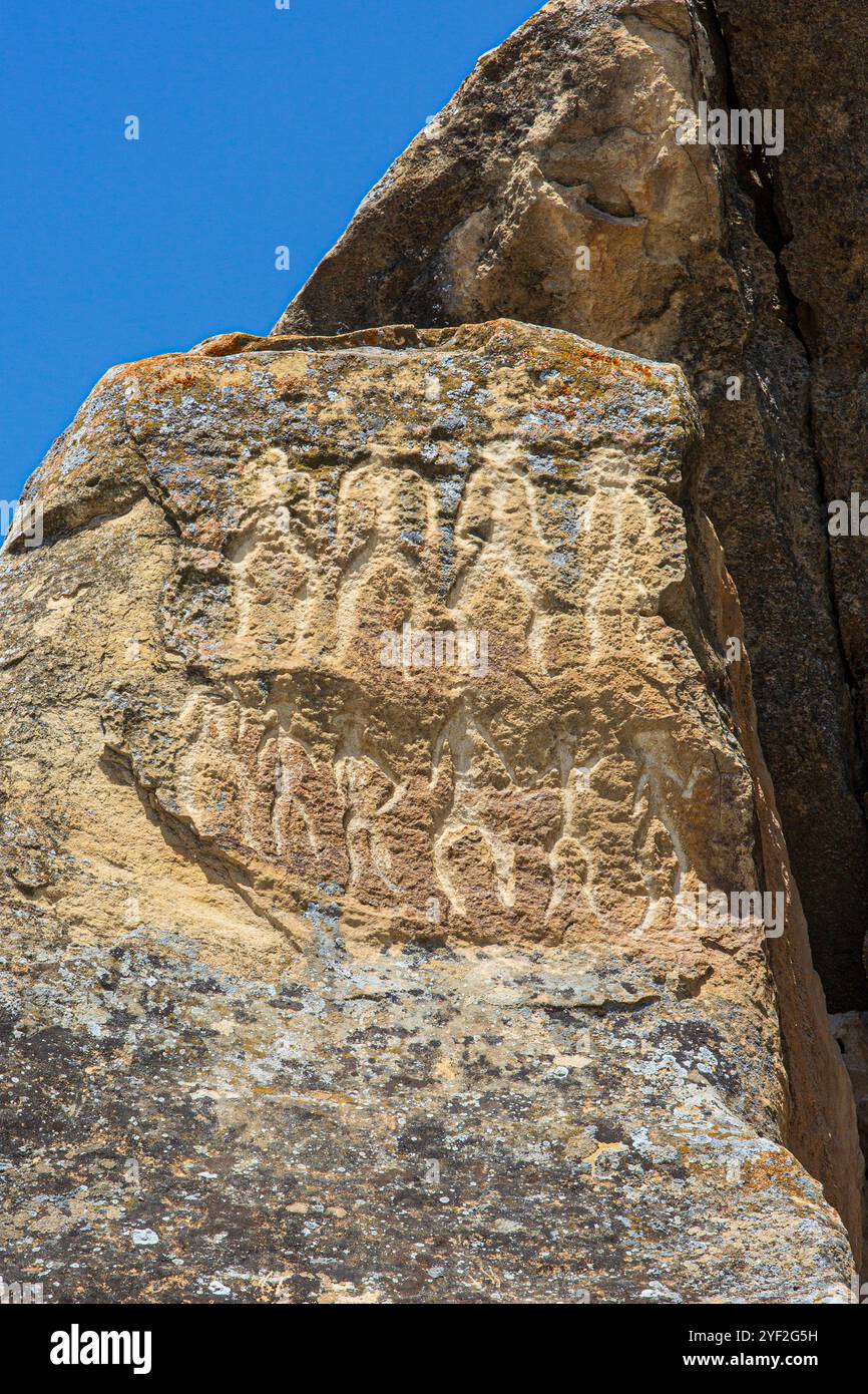 Petroglyphs depicting a pre-historic men (5,000-20,000-year-old) at the ...