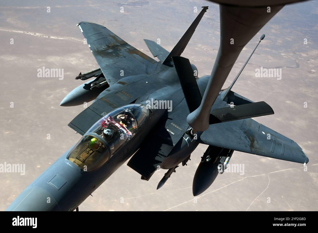 A U.S. Air Force F-15E Strike Eagle refuels from a KC-135 Stratotanker ...