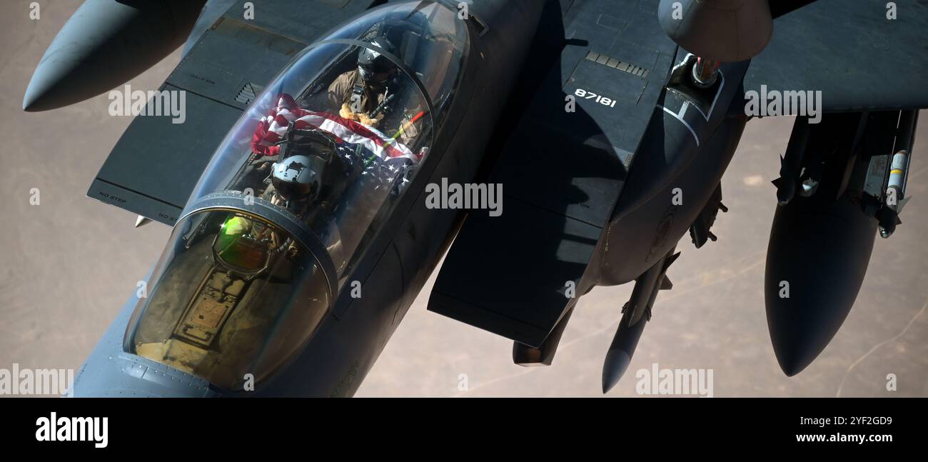 A U.S. Air Force F-15E Strike Eagle refuels from a KC-135 Stratotanker ...